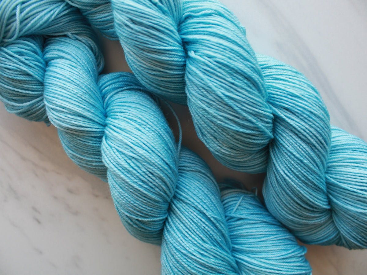 Green and Blue Colorways Made by Purple Lamb Fiber Arts